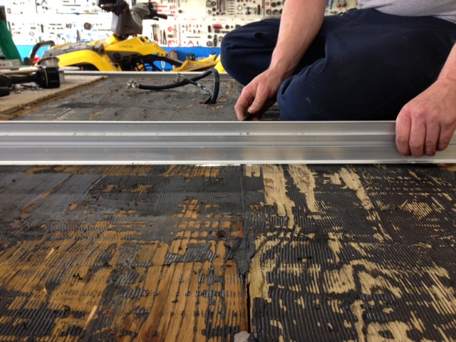 gap showing the buldge between 2 pieces of wood decking | Club Bennington